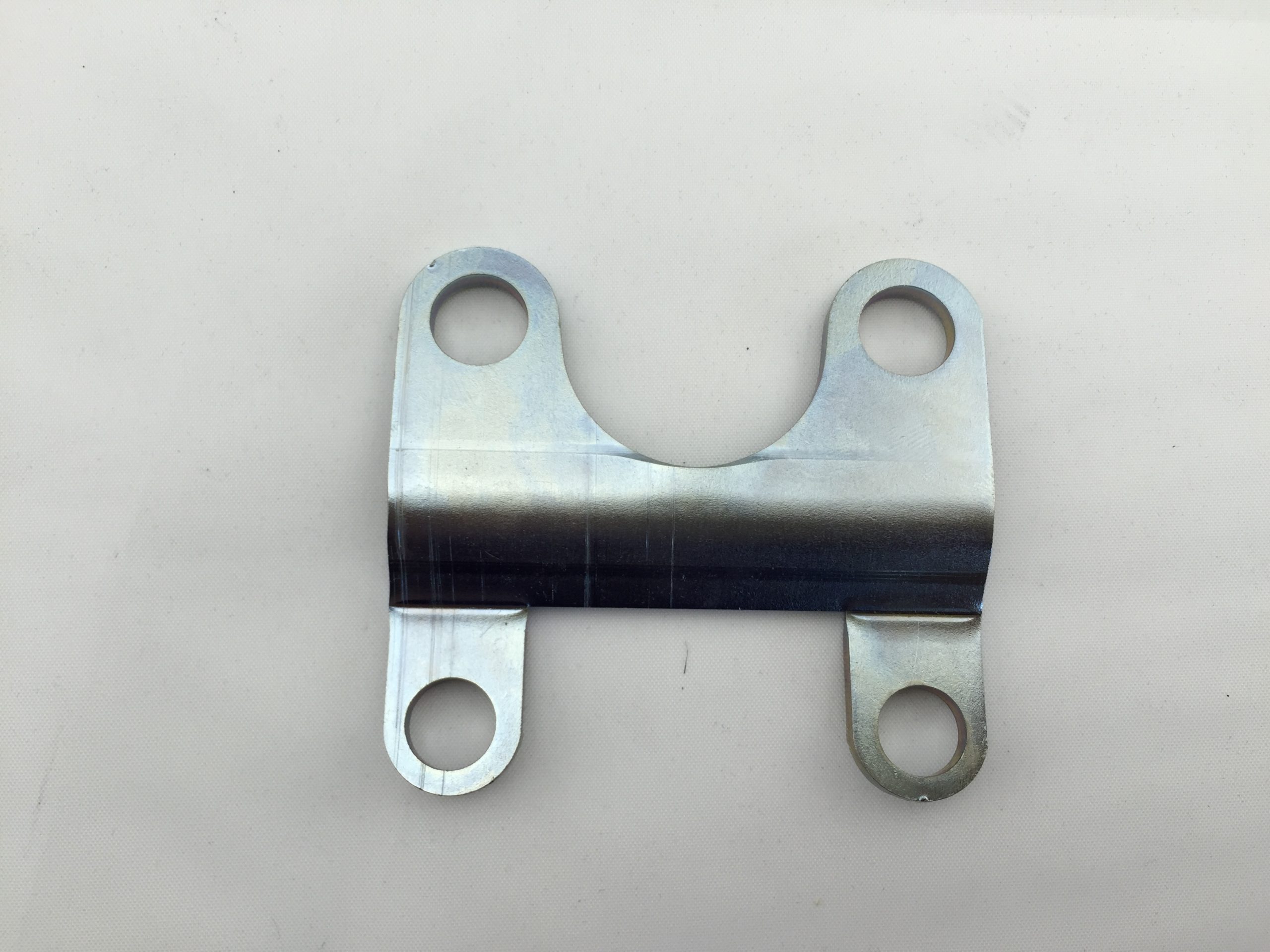 LEFT FRONT BRAKE CALIPER MOUNT PLATE – Factor 1 Racing