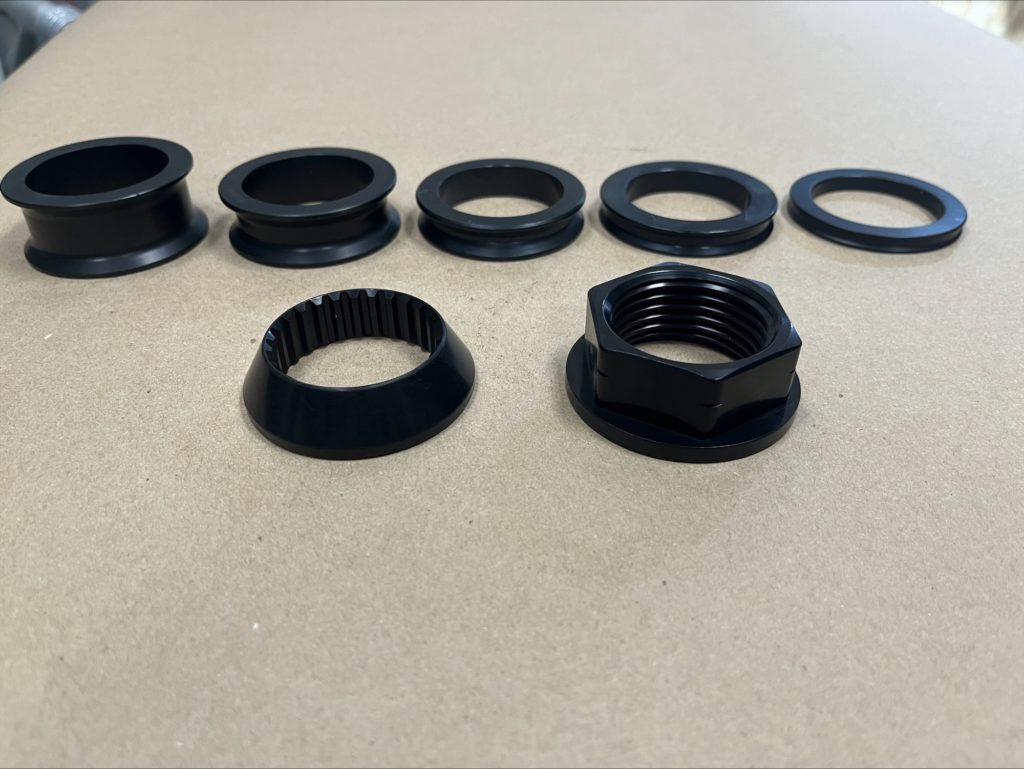 REAR AXLE NUT KIT–STACKED REAR AXLE NUT – Factor 1 Racing
